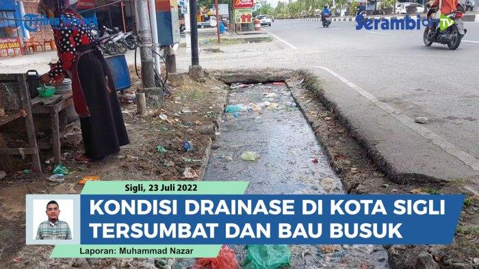 VIDEO Drainase di Kota Sigli Tersumbat, Kondisi Air Berwarna Hitam hingga Tebar Bau Busuk ...
