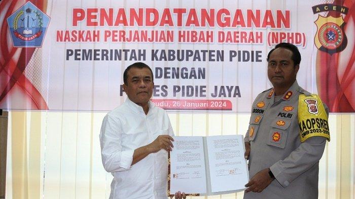 Pemkab Pijay Hibahkan Dana Pengamanan Pemilu ke Polres lewat NPHD - Serambinews.com