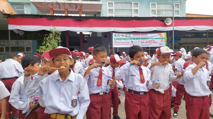 Peringati Hari Kesehatan Gigi dan Mulut, Ribuan Murid di Aceh Sikat Gigi Serentak - Serambinews.com