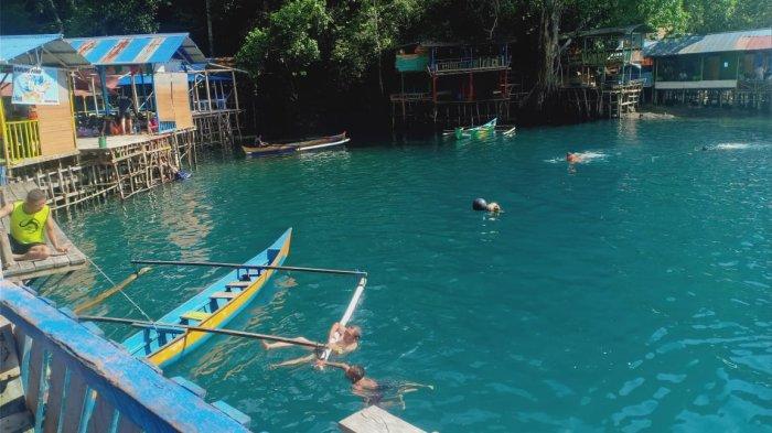 Warga Padati Pantai Lubang Buaya Morella di Hari Minggu Terakhir Jelang ...