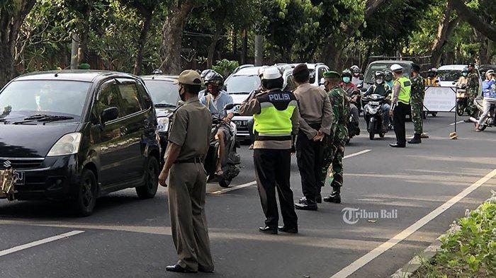 Razia Masker di Renon Denpasar, 4 Pengendara Tak Pakai Masker Didenda Rp 100 Ribu - Tribun-bali.com