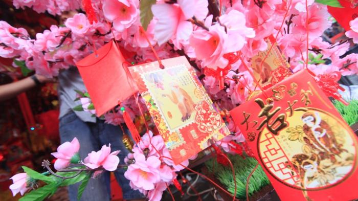 Ini Tujuan Angpau Dibagikan Saat Imlek - Bangkapos.com