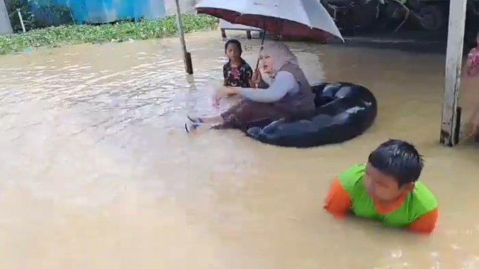Banjir Rendam Permukiman di Bantaran Sungai Tapin, Warga Kelurahan Rangda Mulai Terdampak ...