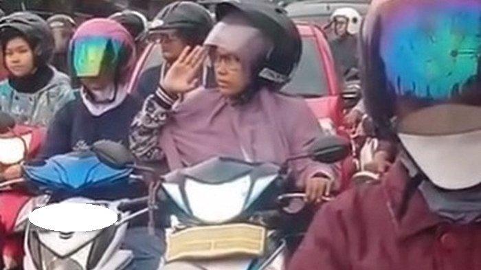 Berhenti di Lampu Merah, Pemotor Ini Langsung Hormat Lihat Merah Putih Dikibarkan di Kodim ...
