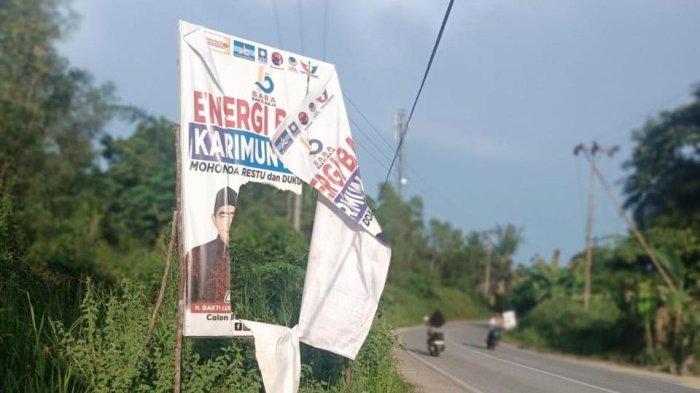 Pilkada Karimun Tercoreng, Ratusan Baliho Hingga Kayu Penyangga Paslon BARA Dirusak - Tribunbatam.id