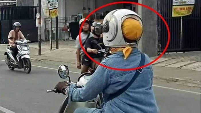 Aksi Emak-emak Pakai Helm Bolong Jadi Viral di Medsos, Warganet Gagal Paham - Tribunbatam.id