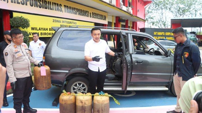 Pelangsir BBM Subsidi Jenis Solar Dibekuk Polisi, Sengaja Modifikasi Tangki Mobil - Tribunbatam.id