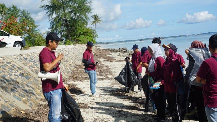 Peringati Hari Bumi, PLN Indonesia Power UBP Kepri Gelar Bersih-Bersih Pantai - Tribunbatam.id