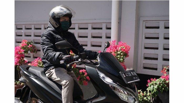 Persiapan Berkendara Sepeda Motor di Musim Hujan - Tribunjabar.id