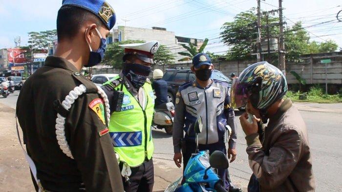 AWAS Tak Pakai Masker Didenda Rp 50 Ribu, Ratusan Orang di Jambi Terjaring Razia - Tribunjambi.com