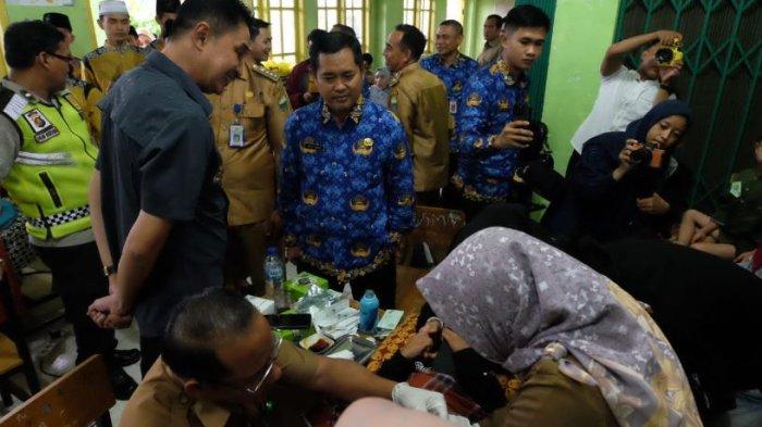 PJ Bupati Muaro Jambi Apresiasi Sunatan Massal di Senaung - Tribunjambi.com