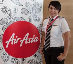 Dewi Meilina Jadi Kapten Pilot Pertama Air Asia Indonesia ...
