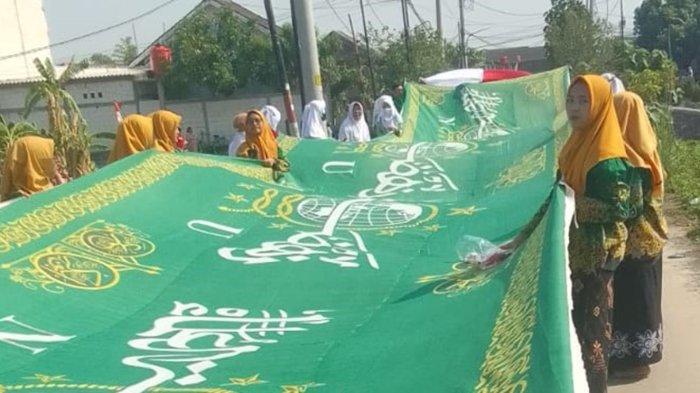 Meriahkan HSN 2023, GP Ansor Kebonbatur Kirab Bendera Sepanjang 50 ...