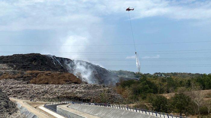 Pemadaman Kebakaran di TPA Putri Cempo: Helikopter Water Bombing Sukses Kendalikan Api ...