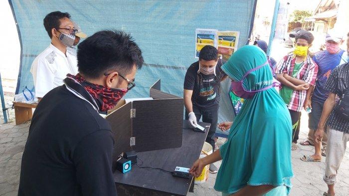 Video Pembagian Daging Kurban Manfaatkan Sensor E-KTP - Tribunjateng.com