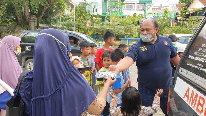 Unit Inafis Satreskrim Polresta Samarinda Bagikan 200 Kotak Makanan di ...