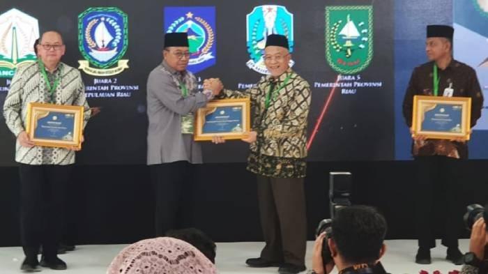 Pj Gubernur NTB Miq Gita Terima Penghargaan Anugerah Adinata Syariah 2024 - Tribunlombok.com