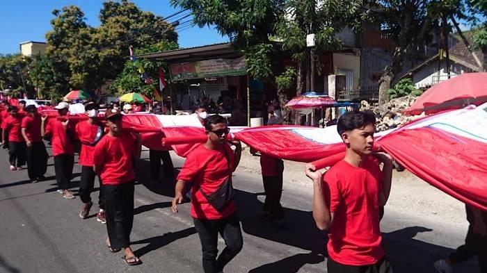 Kirab Bendera Raksasa untuk Perkenalkan Situs Manusia Purba Homo ...