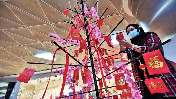 FOTO: Pohon Angpao di MaRI Berhadiah Aneka Voucher - Tribun-timur.com
