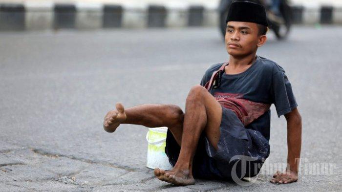 FOTO: Potret Pengemis di Tengah Teriknya Matahari - Tribun-timur.com