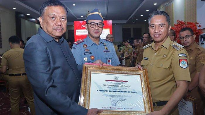 Bupati Boltim Sachrul Mamonto Terima Penghargaan Kabupaten Peduli HAM - Tribunmanado.co.id