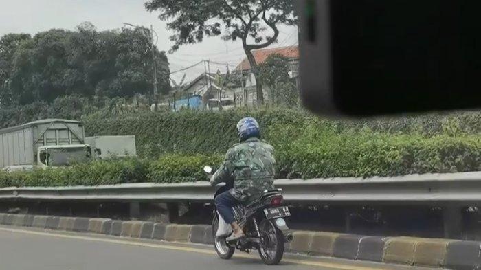 Viral Seorang Pemotor Berjaket Loreng Melintas di Tol Jatiwarna Bekasi, Lolos dari Pantauan ...