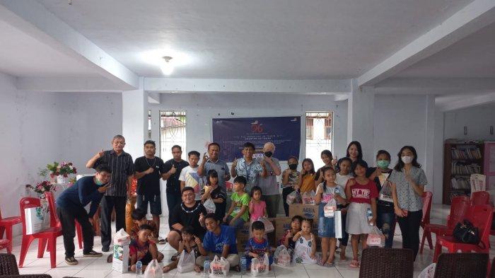 Radio Smart FM Manado Rayakan HUT Ke-26 SmartFM Network di Panti Asuhan Bakti Mulia Karombasan ...