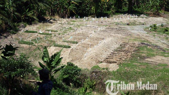 Viral Foto Peti Jenazah Pasien Covid Terbuka di Liang Kubur, Ini ...