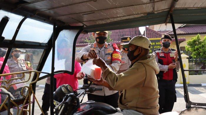 Polres Tebing Tinggi Bagikan 300 Bungkus Takjil - Tribun-medan.com