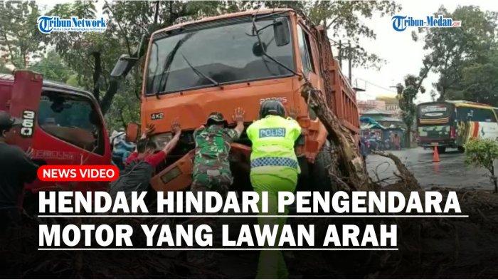 Hendak Hindari Pengendara Motor yang Lawan Arah, Truk Pasir Terguling di Jalan A H Nasution ...