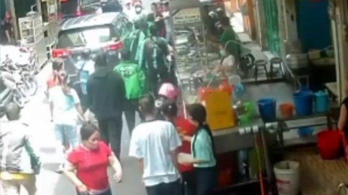 Pengemudi Ojek Online yang Gebuki Pengendara Mobil Kini Masuk DPO Polisi - Tribun-medan.com