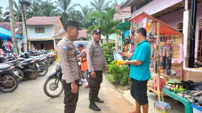 Polsek Dolok Sambangi Pasar Tempel Maklumat Kapolres Tapsel Tribun