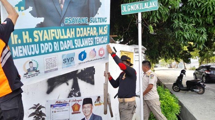 Bawaslu Gandeng Satpol PP Tertibkan Baliho dan Spanduk Caleg di Kota Palu - Tribunpalu.com