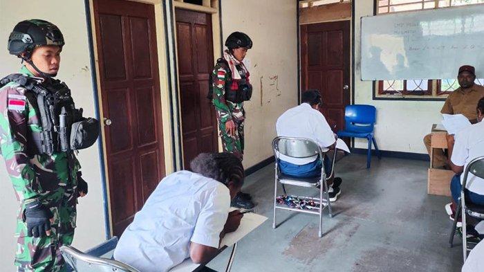 Dukung Dunia Pendidikan, Personel Satgas Yonif R 631/ATG Kawal US SMPN ...