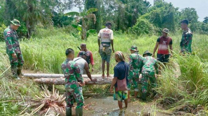 Satgas Pamtas Yonif 123/Rajawali Bangun Jembatan Menuju Sawah di Kondo ...