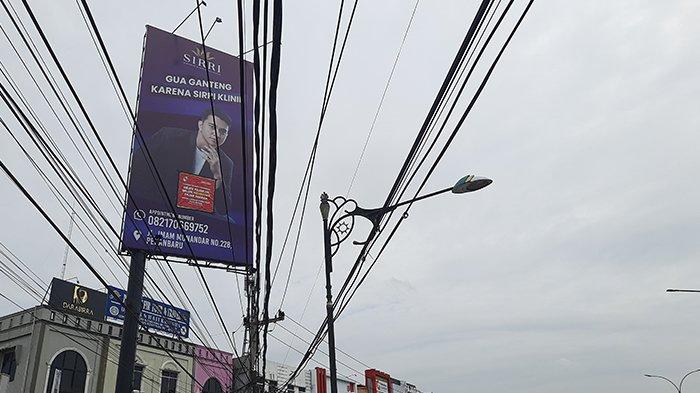 Bapenda Tertibkan Reklame yang Habis Masa Tayang dan Tiang Reklame yang Habis Izinnya di ...