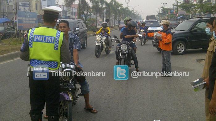 Cek Fakta: Pengendara yang Tak Pakai Masker Akan Ditilang & Diberi Denda Rp 250 Ribu ...