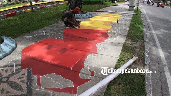 FOTO: Mural Artist Ikut Warnai Trotoar Jalan Sudirman Pekanbaru ...