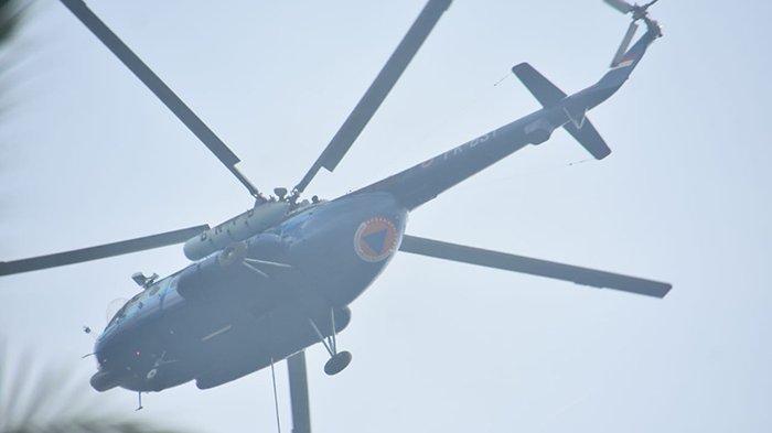 Dua Helikopter Water Bombing yang Bantu Padamkan Karhutla Ditarik dari Riau, Ini Penyebabnya ...