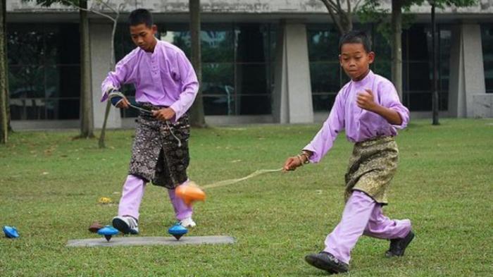 Permainan Gasing Hampir Punah - Tribunpekanbaru.com