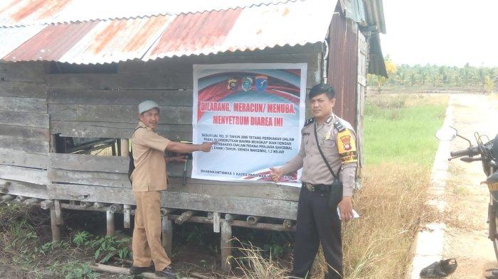Polsek Mempawah Timur Pasang Banner Imbauan Larangan Meracun hingga ...
