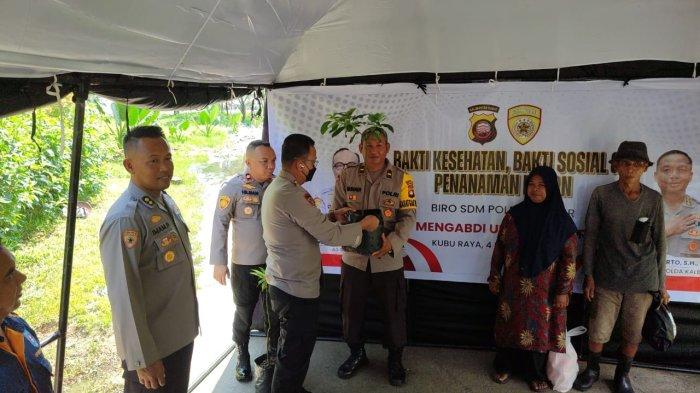 Wakapolres Kubu Raya Hadiri Gelar Bakti Kesehatan, Sosial dan Penanaman Pohon di TPA Rasau Jaya ...