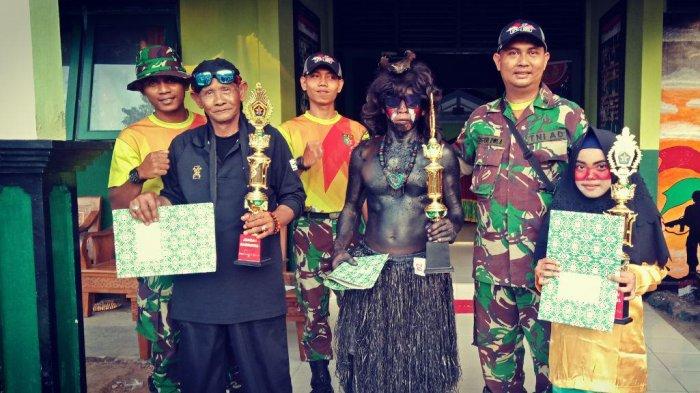 Kostum Adat Papua Meriahkan Karnaval HUT RI di Perbatasan Entikong ...