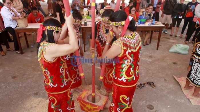 Foto-foto Lomba Menumbuk Padi dan Menampi di Pekan Gawai Dayak ke-32 ...