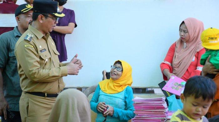 Pj Bupati Kayong Utara Pantau Langsung Pelayanan Posyandu di Desa Matan Jaya - Tribunpontianak.co.id