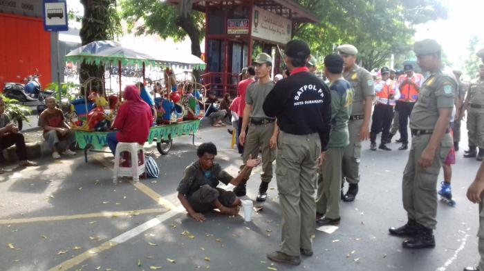 Nyamankan Pengunjung Car Free Day, Satpol PP Kota Solo Razia Pengemis dan Gelandangan ...