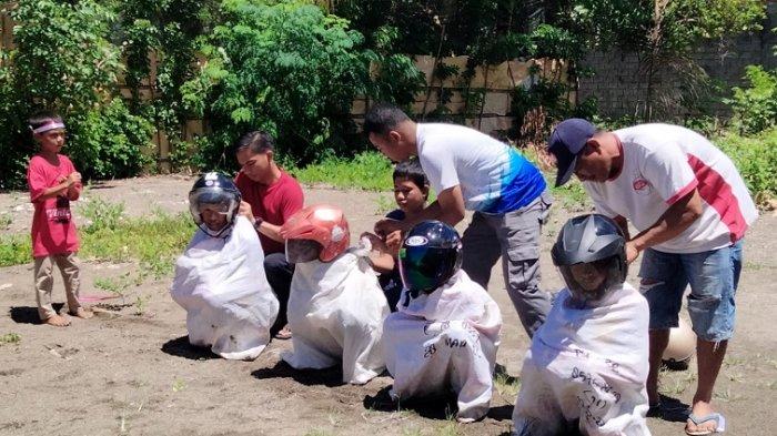 Lucunya Tingkah Anak-Anak Pasangkayu Lomba Balap Karung Pakai Helem - Tribun-sulbar.com