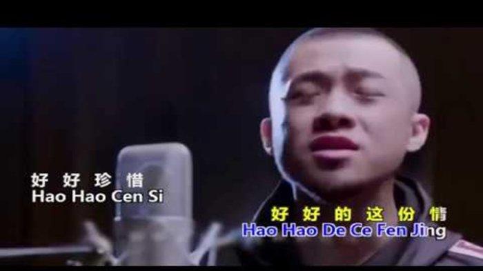 Lirik dan Chord Gitar Lagu Wo Men Bu Yi Yang, Da Zhuang, Viral Di Media Sosial 2022 ...