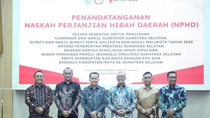 Pj Gubernur Sumatera Selatan dan Ketua KPU Tanda Tangani NPHD Dana ...