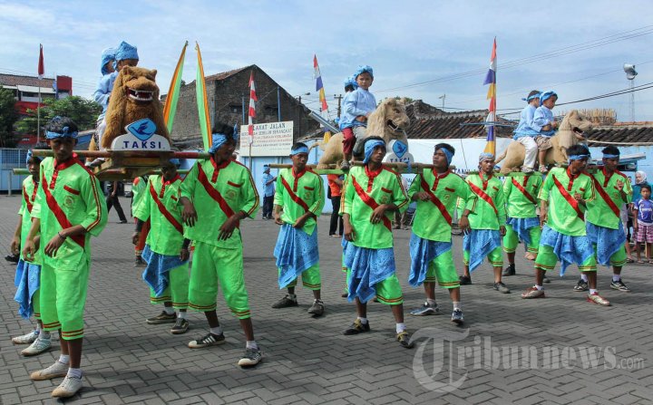 Naik Singa Depok BLUE BIRD, Foto 2 #626632 - TribunNews.com